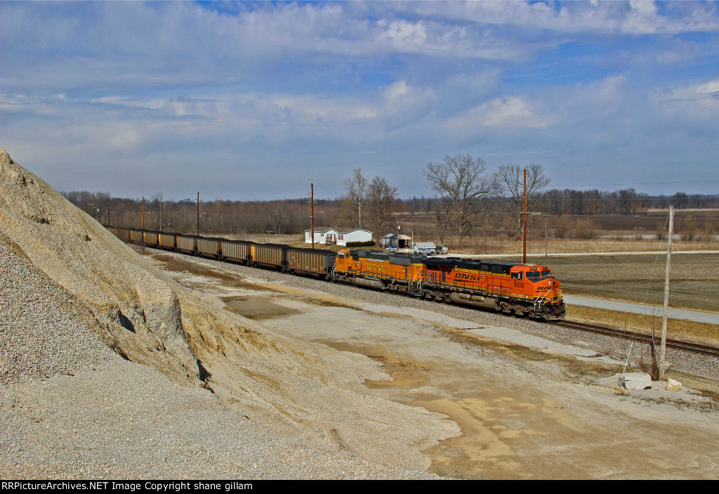 BNSF 6030 Leads a coal load Sb down the k line.